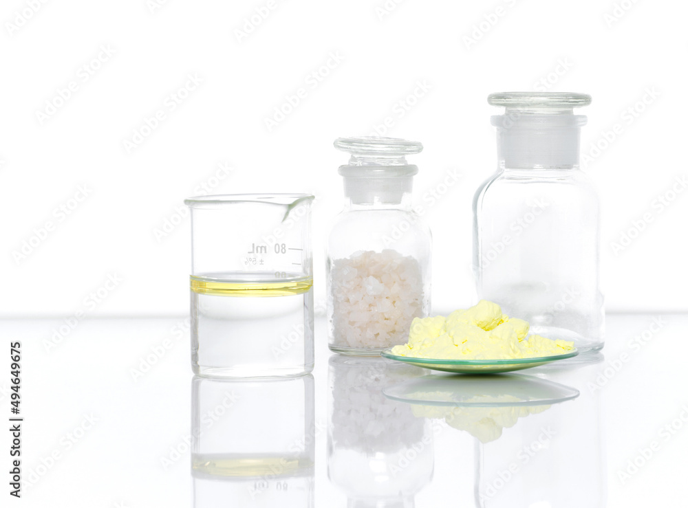 Closeup chemical ingredient on white laboratory table. Sulfur Powder in ...