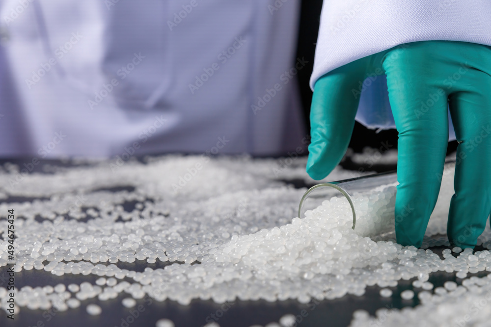white plastic grain, plastic polymer granules,hand hold Polymer pellets ...