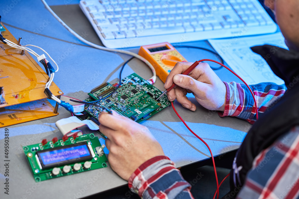 Repairing Hardware Equipment. Repair Shop and Worker with Tools ...