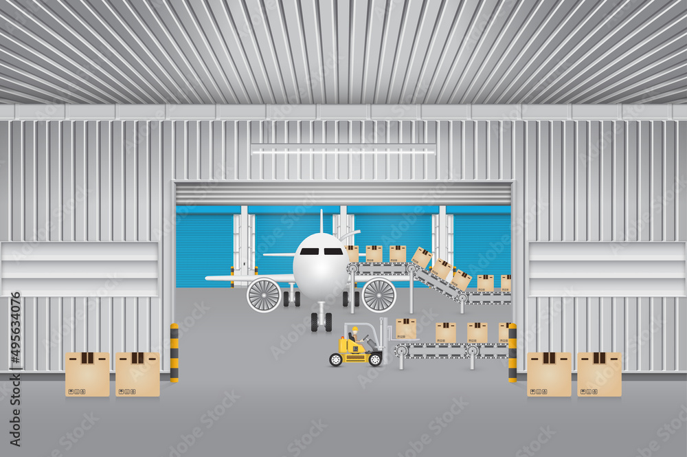 Operator loading cargo box to airplane storage by forklift inside ...