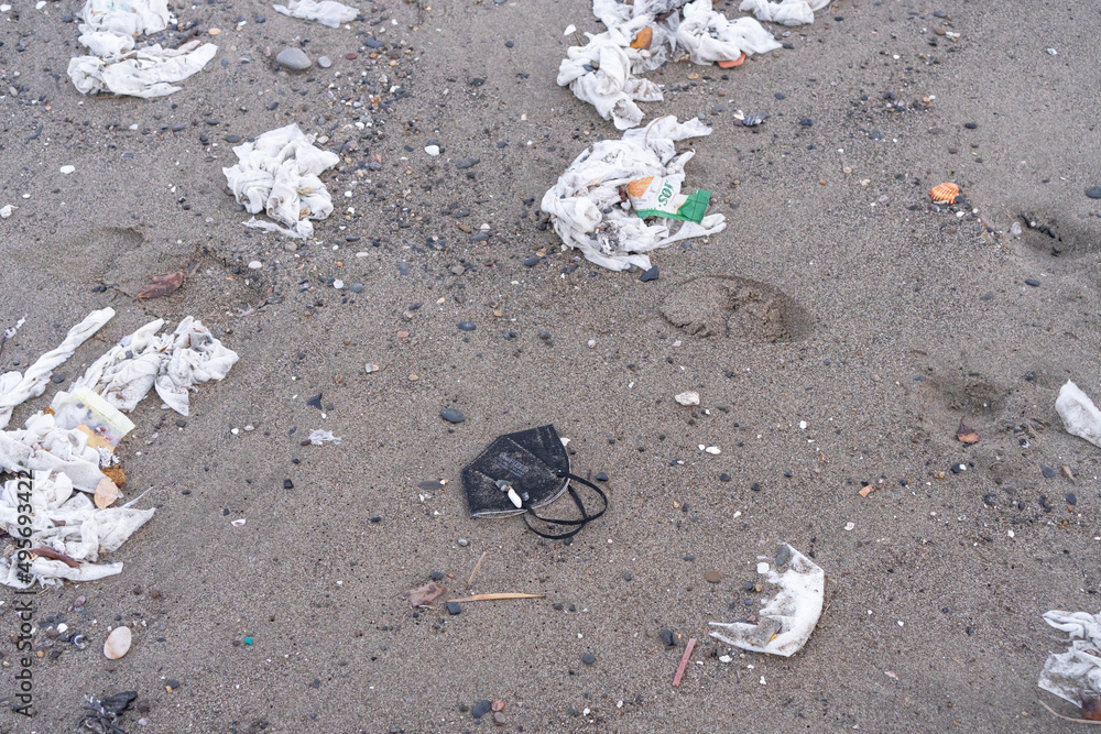 Beach full of garbage, wet wipes and waste that people throw in the ...