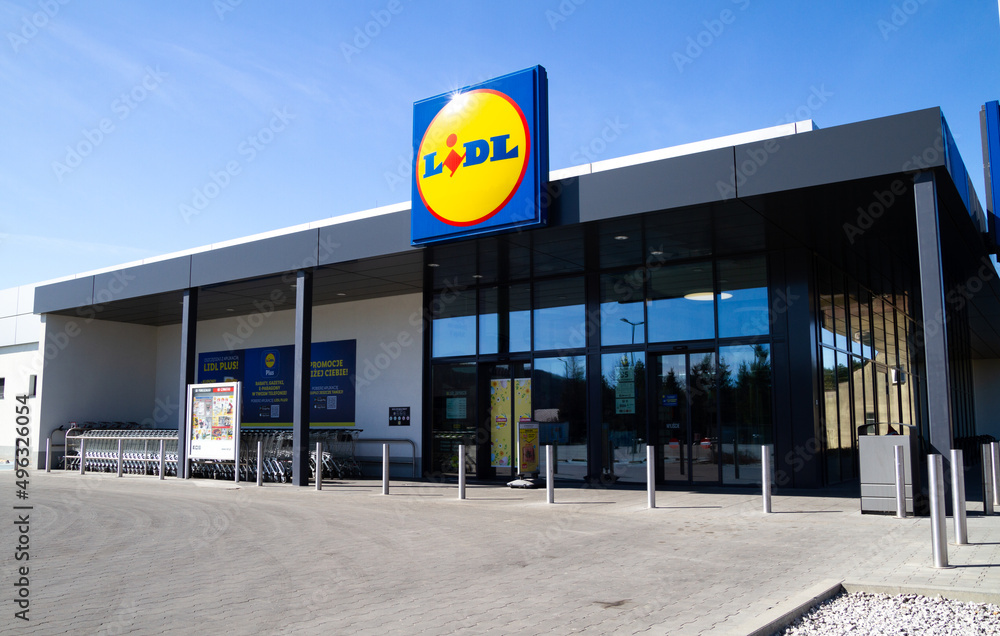 Lidl shop entrance, with brand logo signboard. German international ...