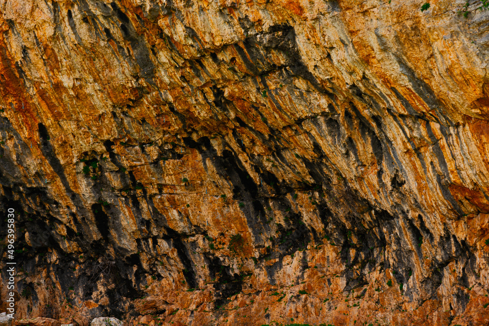 Compressed vertical rock layers formation in various colors and ...
