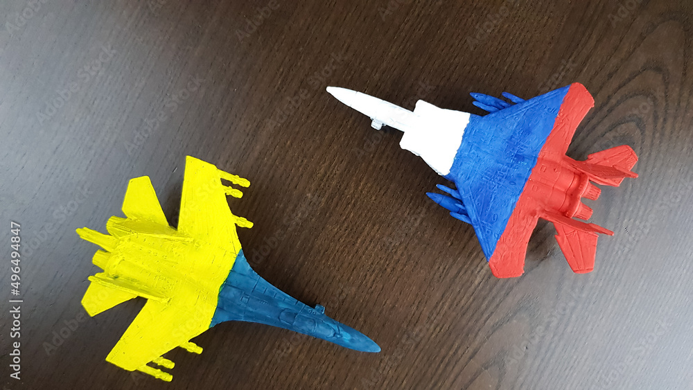 models of Russian and Ukrainian military aircraft are painted in the ...