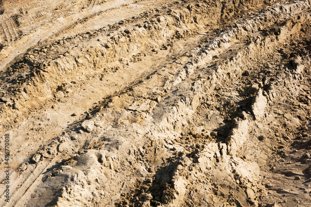 Tyre mark background. Tire track shape. Trail lines on dry brown sand ...