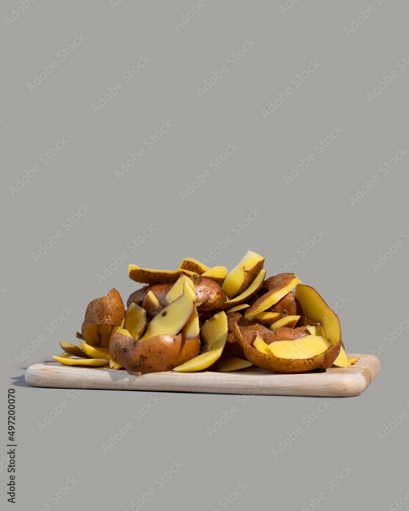 Concept of Stop food waste day. Potato peels are one of the most ...