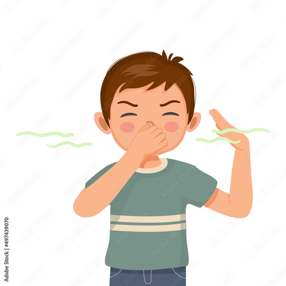 cute little boy pinching and cover his nose smelling something stinky and bad aroma holding ...