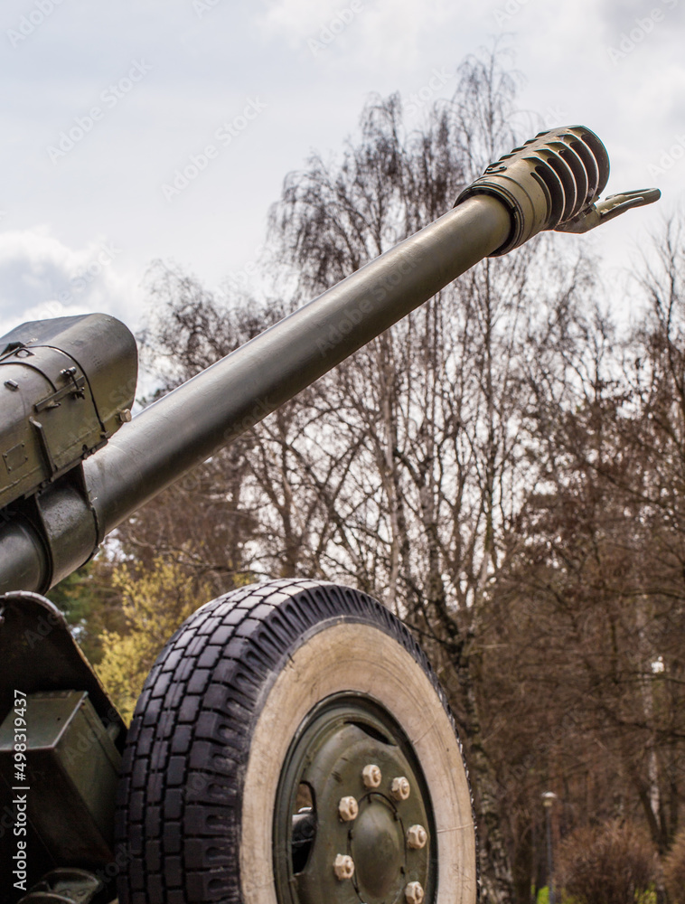 Tank and howitzer stand on the street in Ukraine. In the Kiev park ...