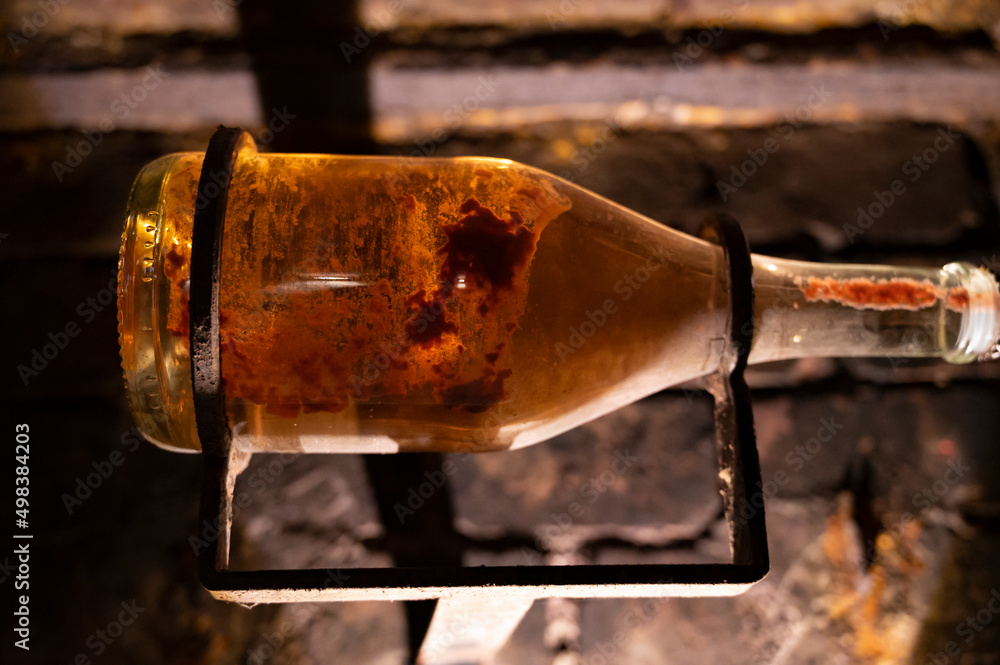 Sparkling wine production by traditional methods in underground cellars ...