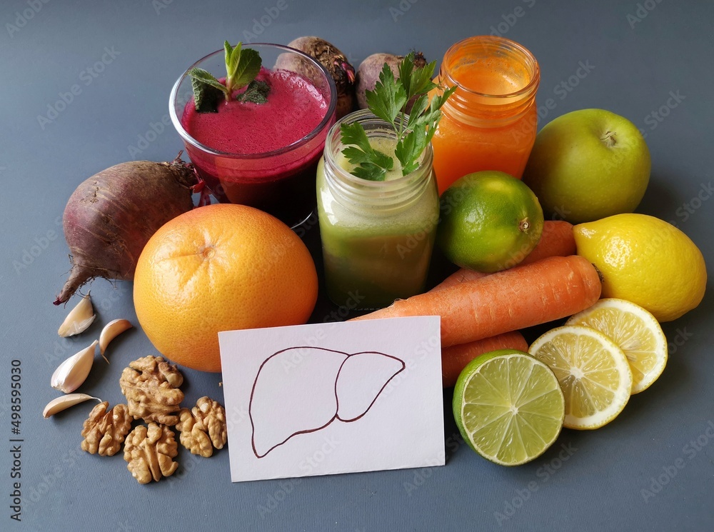 Liver detox juice in a glass jar with ingredients. Fresh smoothie for ...
