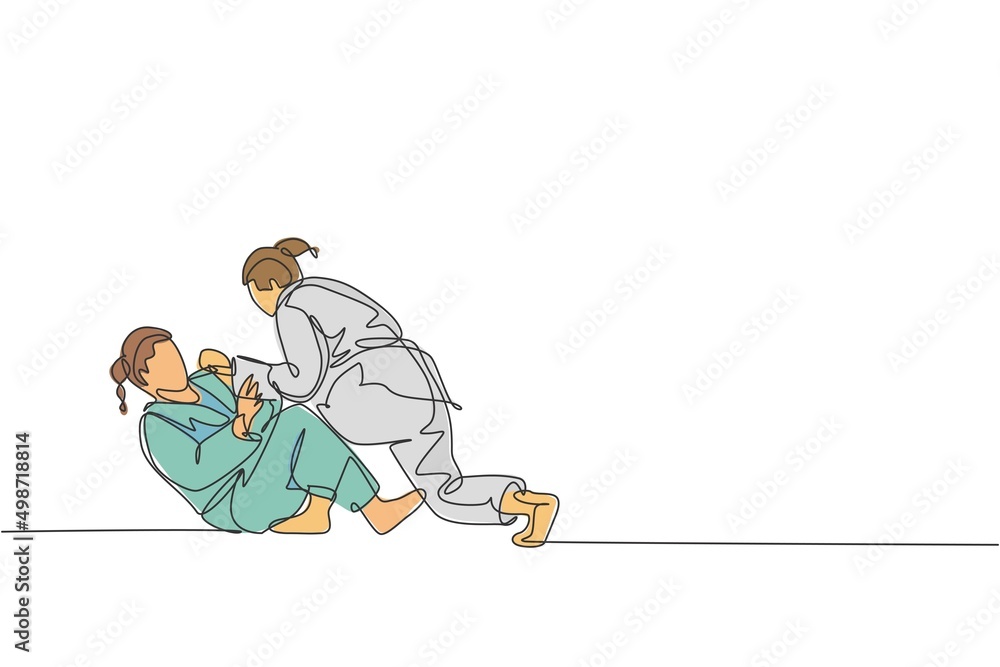 Vector de Stock One single line drawing of two young energetic judoka ...