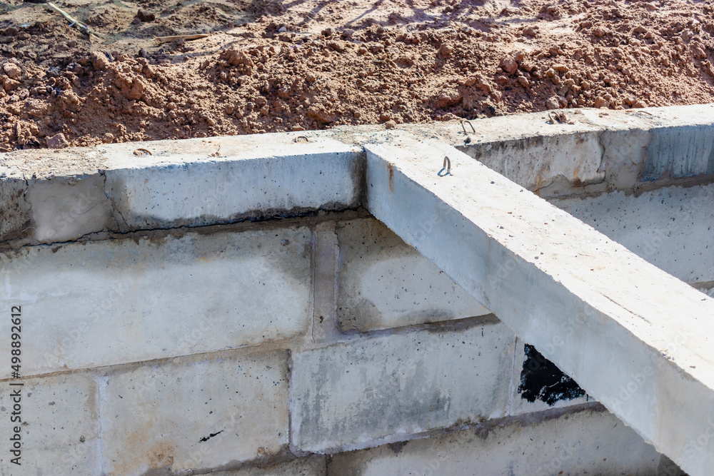 Laying of underground pipes in concrete chamber. Installation of water ...