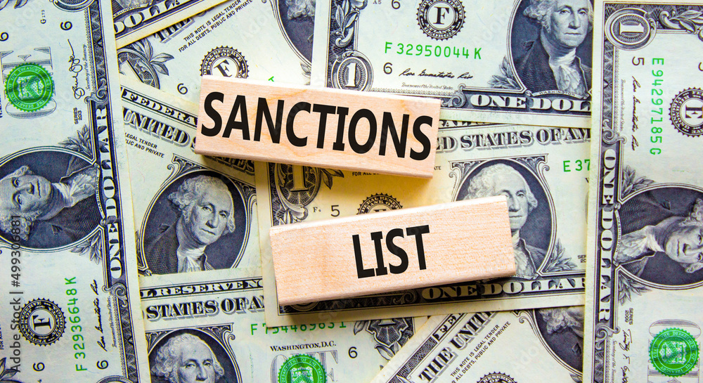 Sanctions list symbol. Wooden blocks with concept words Sanctions list ...