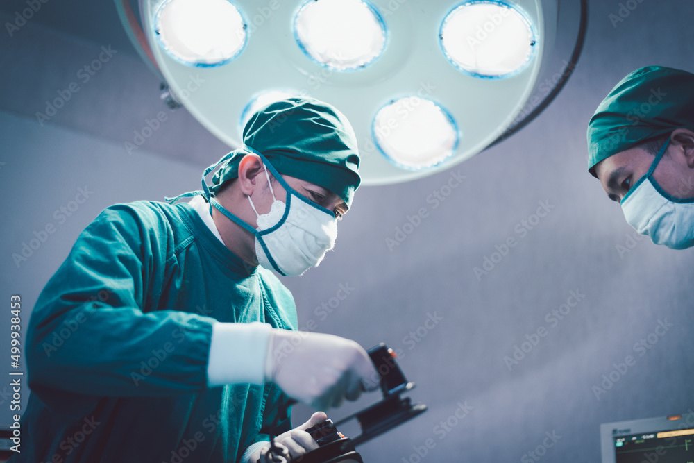 Medical urgency doctor using defibrillator during surgical operation a ...
