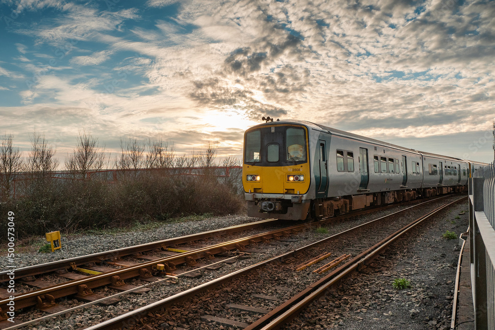 Galway, Ireland - 03.25.2022: Irish rail train on a track to town ...