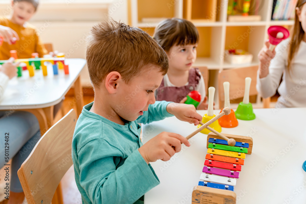 Kindergarten Children Learning Music Using Various Colorful Instruments ...