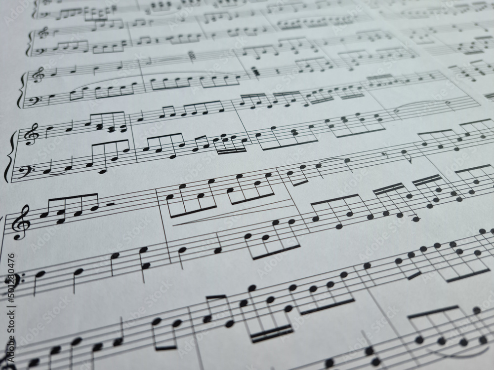 Music notes background. Musical concept macro view of white score sheet ...