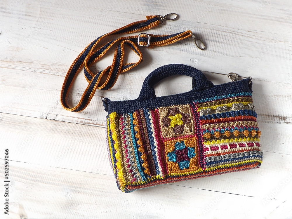 Colorful crochet bag using various stitches and pattern. Concept of ...