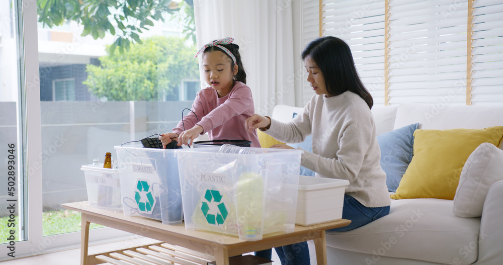 Стоковое фото «Mom teach Gen Z preteen girl kid dump paper glass can e ...