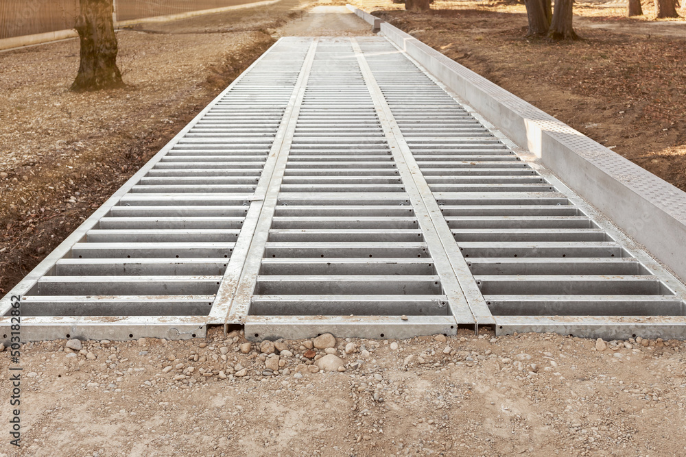 Drainage system on Road. Waterway under Road. Grate of water drain ...