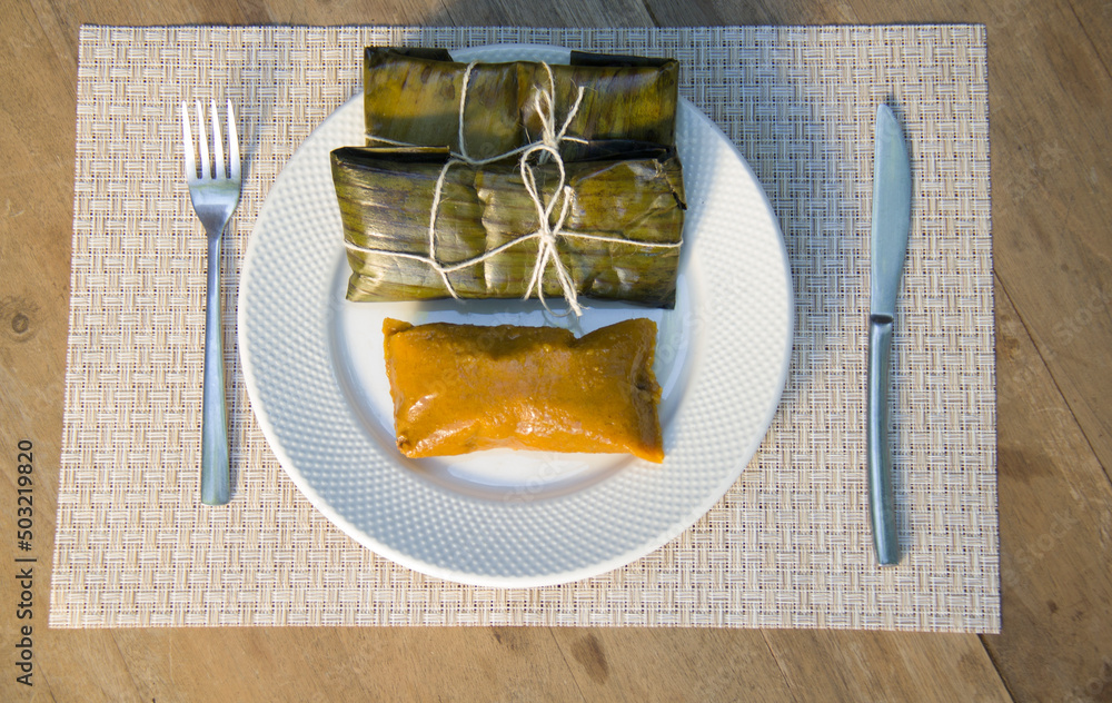 Dominican Pasteles en Hoja is a plantain and tuber dough filled with ...