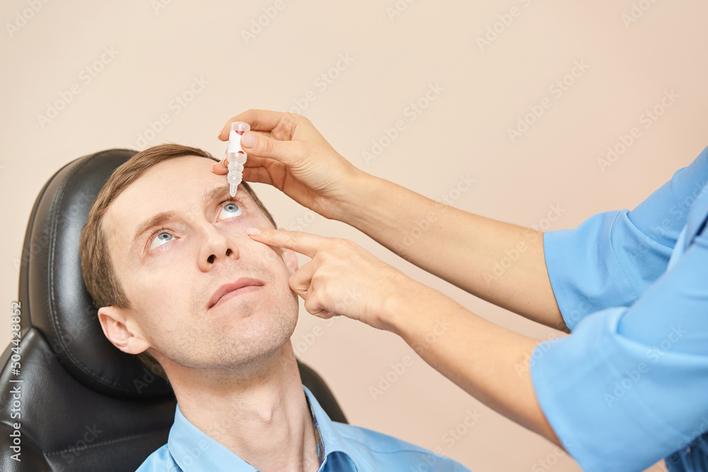 ophthalmologist medical patient. eyedrop apply. Eye clinic treatment ...