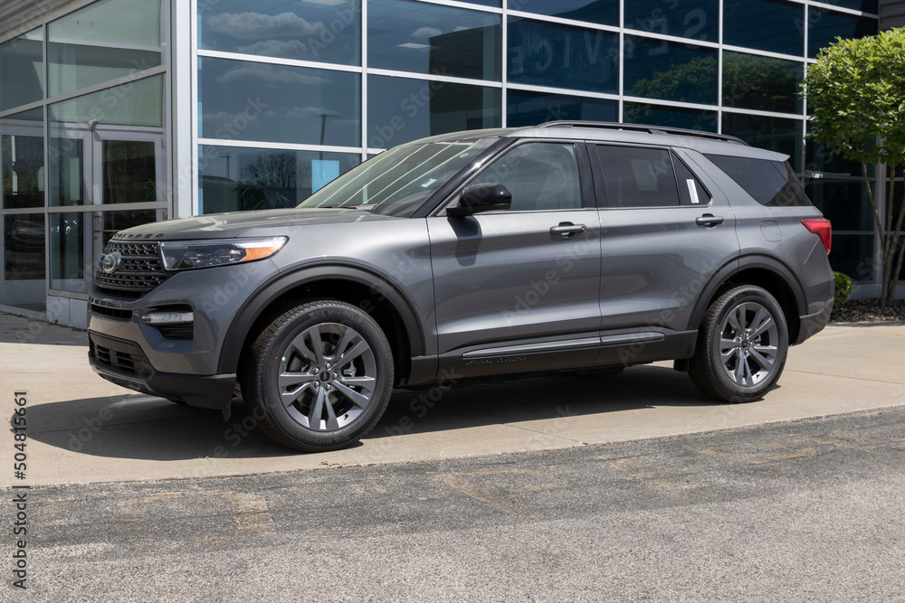 Ford Explorer display at a dealership. Ford offers the Explorer in a ...