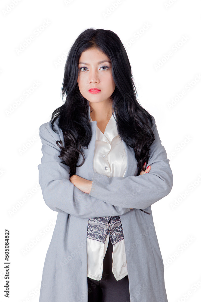 Businesswoman standing with haughty expression Stock Photo | Adobe Stock