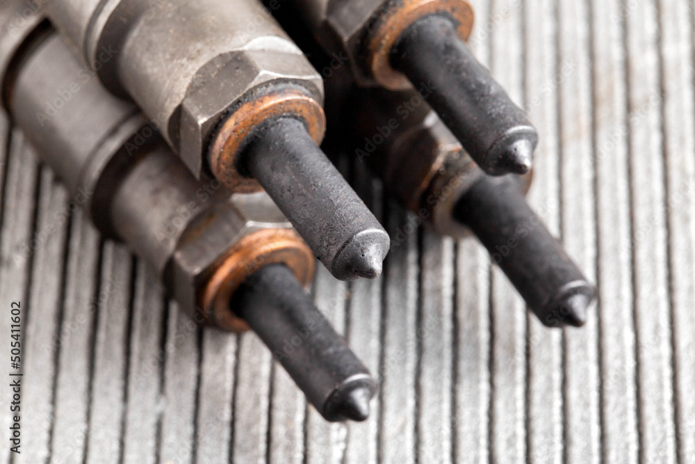 Needles and nozzles on nozzles from a diesel engine. Deterioration of ...