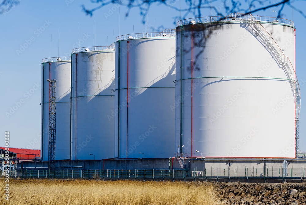 Fuel and lng gas storage tanks at oil terminal. Liquefied natural gas ...