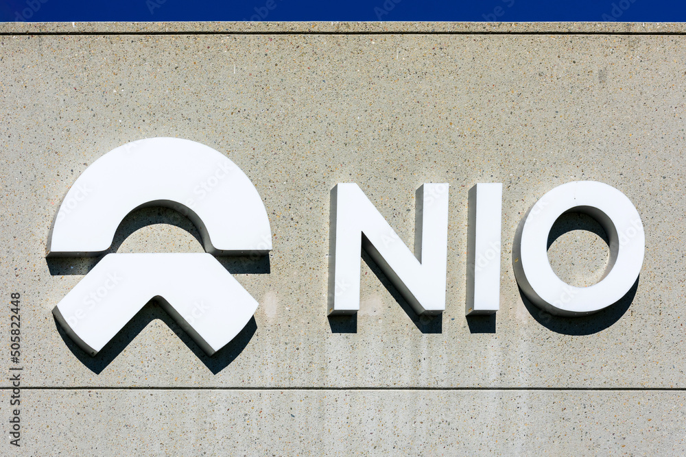 NIO logo, sign atop of North American headquarters and global software ...
