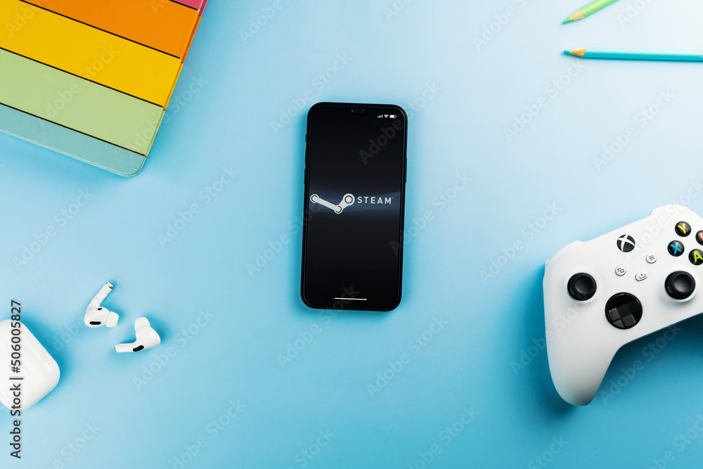 Foto Steam video game digital distribution service app on the ...