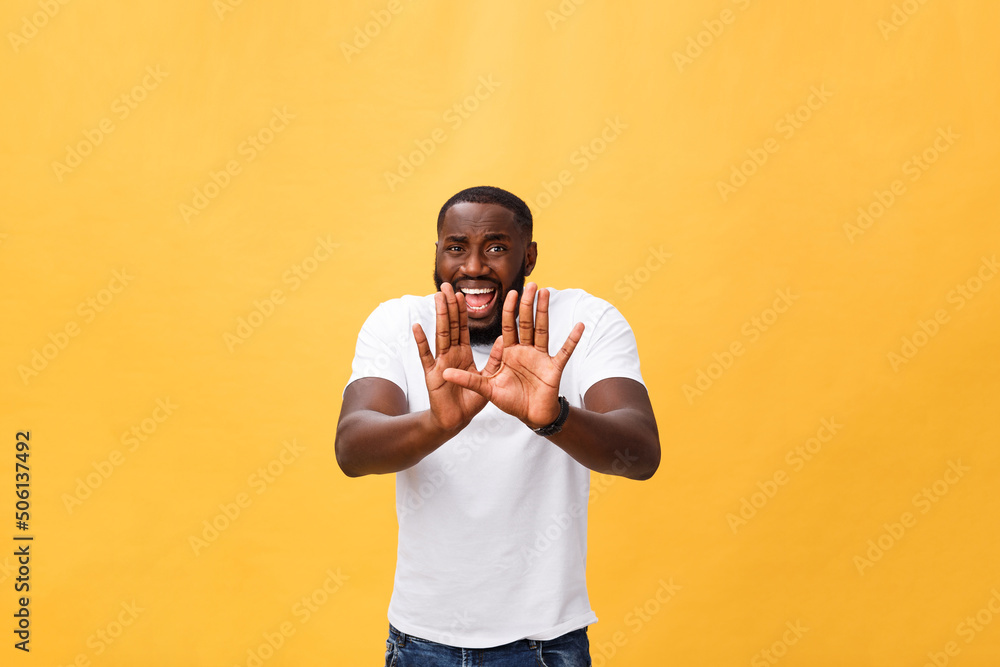 Portrait shock and annoyed displeased young man raising hands up to say ...