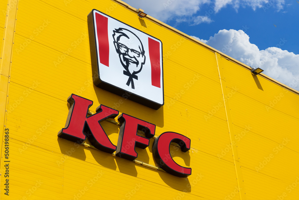 Krasnoyarsk, Russia - May 19, 2022: Red KFC restaurant logo on yellow ...