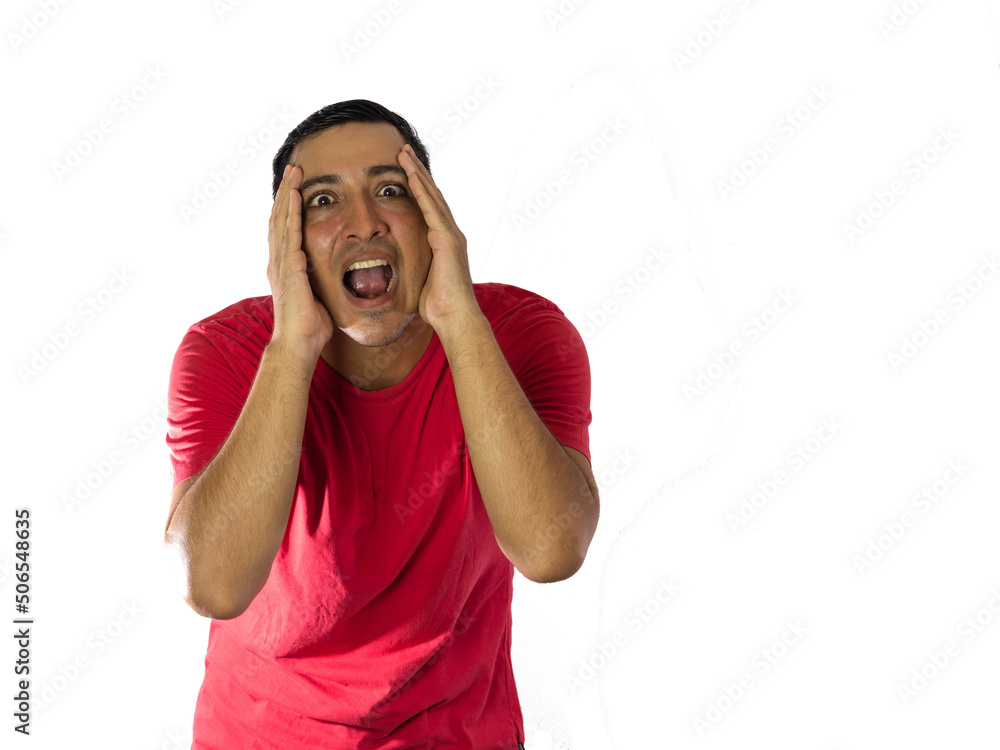 latin man, holding his face with his hands in a very surprised ...