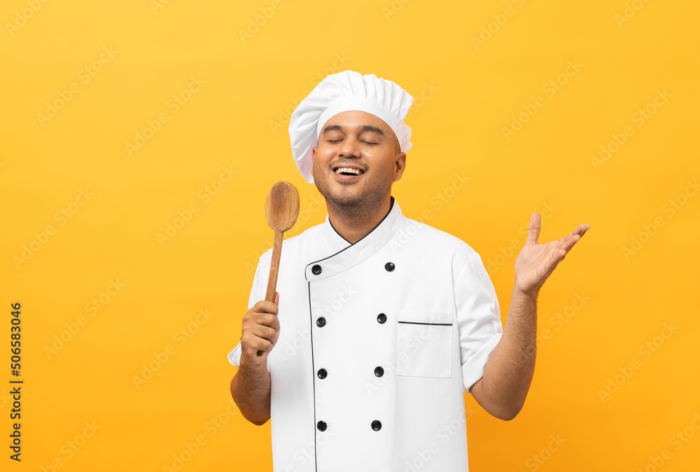 Super star singing masterchef. Young happy asian chef wearing uniform ...