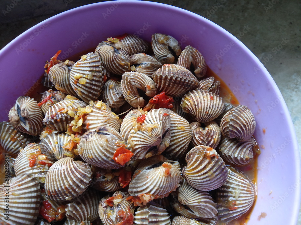 Boiled cockles, blood clams seasoned with red onion, garlic and cayenne ...