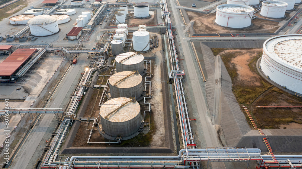 Aerial view fuel reservoirs petroleum industrial zone and metal exhaust ...