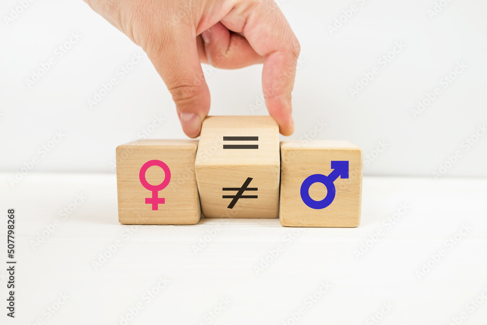 Gender equality symbol. The hand rotates the cube and changes the ...