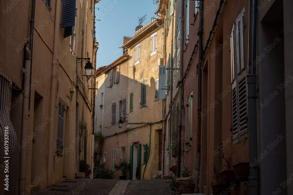 Sunny day in South of France, walking in ancient Provencal coastal town ...