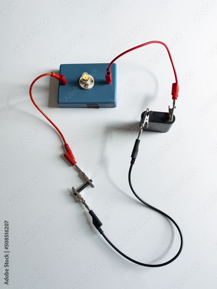 Physics experiment to determine the conductivity of graphite. The light ...