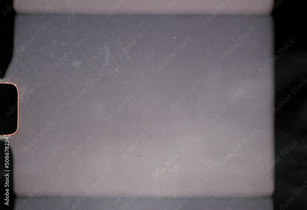 scan of blank or empty 8mm film frame with dust and scratches, cool ...