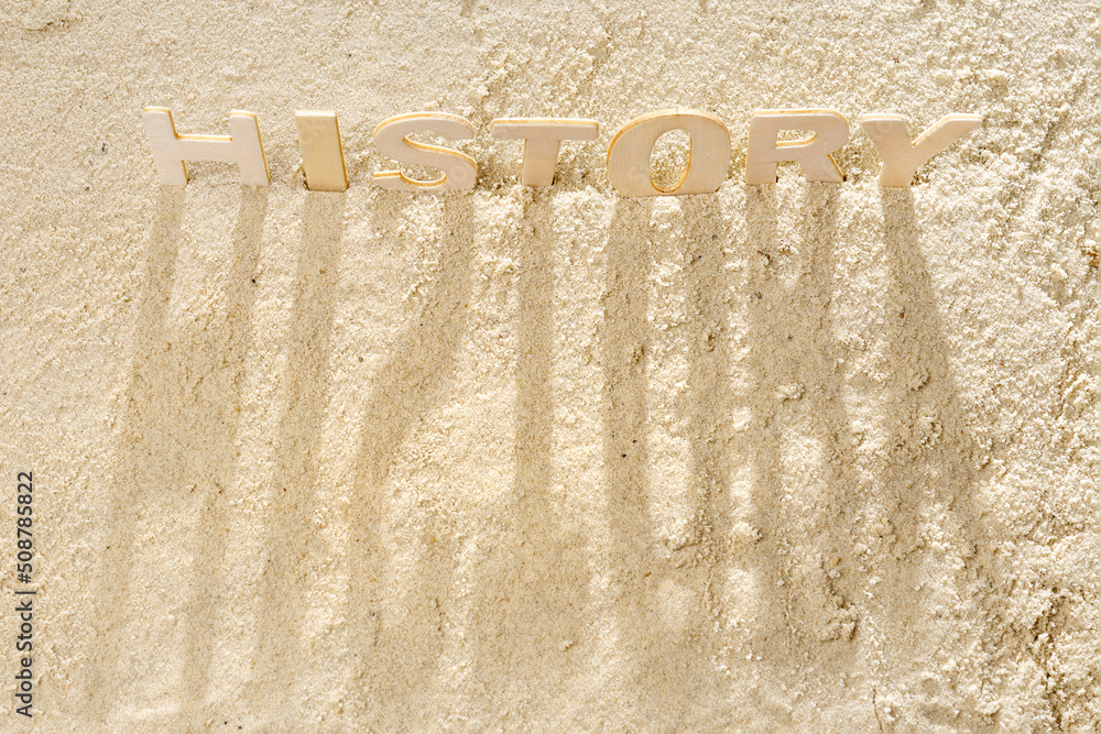 top view on the word history, long shadows from the word history on the ...