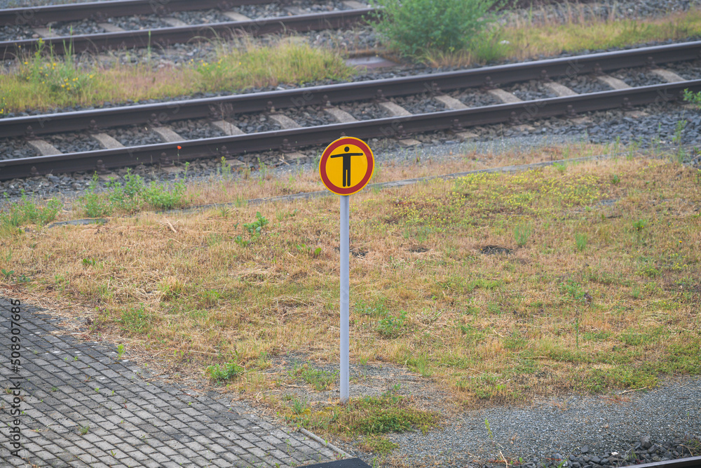 Traffic signs in a railway train station showing that the access of ...