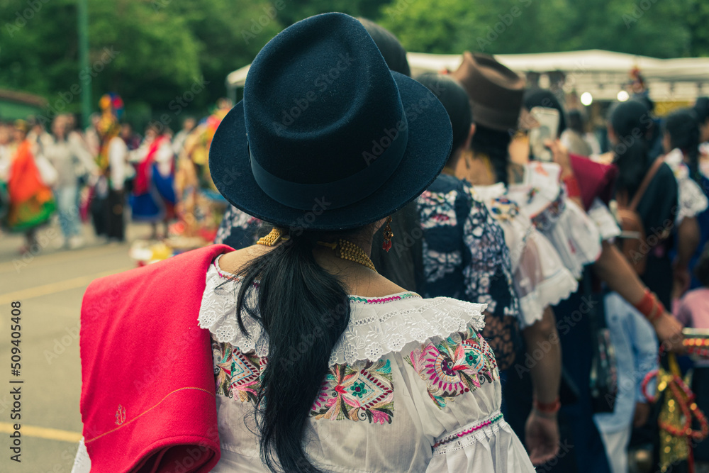 Ecuadorian indigenous men and women dressed in their typical costumes ...