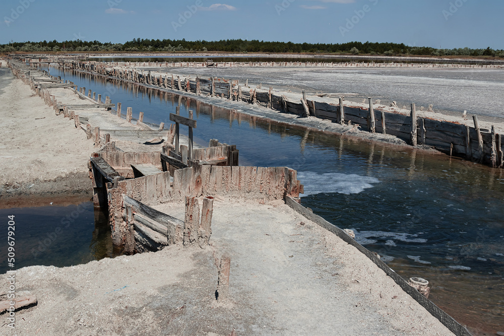 sea water in an artificial reservoir for salt extraction by evaporation ...