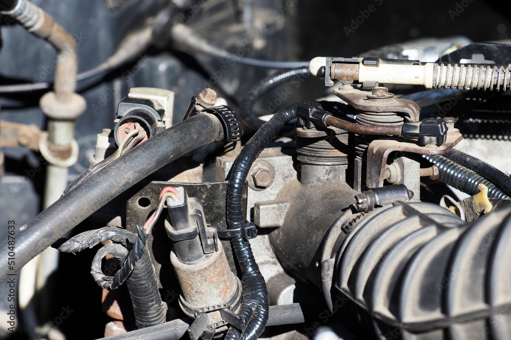 Car gas equipment. Connection of methane gas injectors to the intake ...