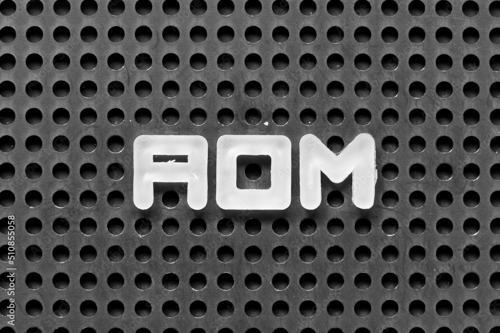 White alphabet letter in word AOM (Abbreviation of Advanced order ...