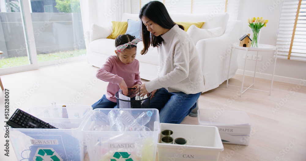 Mom teach Gen Z preteen girl kid dump paper glass can e-waste bag in ...