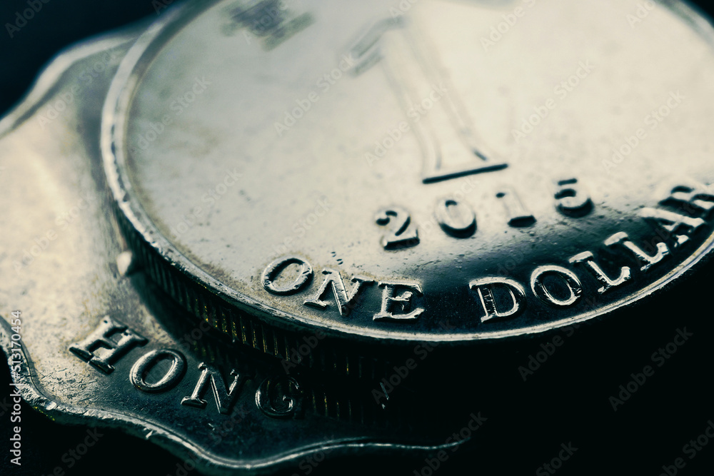 1 one Hong Kong dollar. Fragment of textured coin. Dark tinted ...